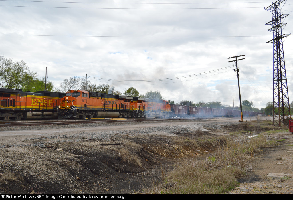 BNSF 8275 with a ballest load, reason its smoking it dropped an injecter